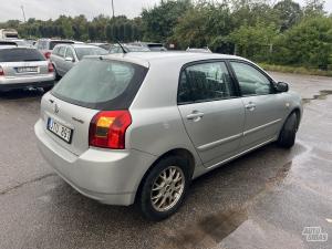 Grey Toyota Corolla 2003 in Siauliai, with an engine capacity of 2.00 L and mileage of 0 thousand km for 1100 €, photo  on AUTOMOTO.COM.LV