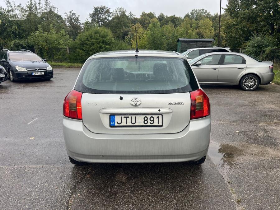Grey Toyota Corolla 2003 in Siauliai, with an engine capacity of 2.00 L and mileage of 0 thousand km for 1100 €, photo 5 on AUTOMOTO.COM.LV