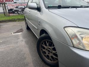 Grey Toyota Corolla 2003 in Siauliai, with an engine capacity of 2.00 L and mileage of 0 thousand km for 1100 €, photo 11 on AUTOMOTO.COM.LV