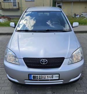 Grey Toyota Corolla 2003 in Vilnius, with an engine capacity of 2.00 L and mileage of 196 thousand km for 1250 €, photo  on AUTOMOTO.COM.LV