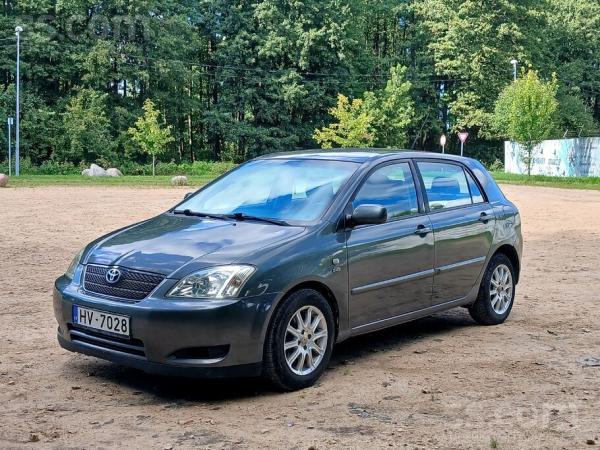 Pelēks Toyota Corolla 2003 Rīga, ar dzinēja tilpumu 2.00 L un nobraukumu 0 tūkst. km par 1000 €, foto 1 vietnē AUTOMOTO.COM.LV