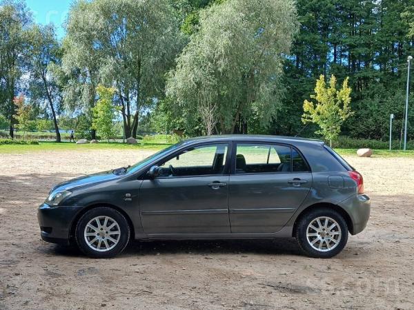 Pelēks Toyota Corolla 2003 Rīga, ar dzinēja tilpumu 2.00 L un nobraukumu 0 tūkst. km par 1000 €, foto 3 vietnē AUTOMOTO.COM.LV