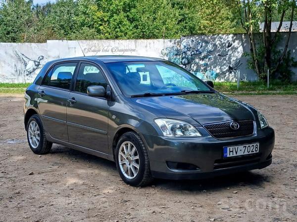 Pelēks Toyota Corolla 2003 Rīga, ar dzinēja tilpumu 2.00 L un nobraukumu 0 tūkst. km par 1000 €, foto 5 vietnē AUTOMOTO.COM.LV