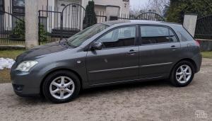 Grey Toyota Corolla 2004 in Vilnius, with an engine capacity of 2.00 L and mileage of 388 thousand km for 1450 €, photo 2 on AUTOMOTO.COM.LV