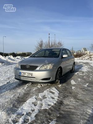 Grey Toyota Corolla 2004 in Vilnius, with an engine capacity of 2.00 L and mileage of 329 thousand km for 1350 €, photo  on AUTOMOTO.COM.LV