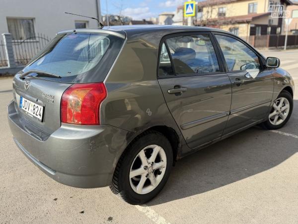 Pelēks Toyota Corolla 2004 Kauņa, ar dzinēja tilpumu 2.00 L un nobraukumu 256 tūkst. km par 1480 €, foto 6 vietnē AUTOMOTO.COM.LV