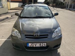 Grey Toyota Corolla 2004 in Kaunas, with an engine capacity of 2.00 L and mileage of 256 thousand km for 1480 €, photo 2 on AUTOMOTO.COM.LV