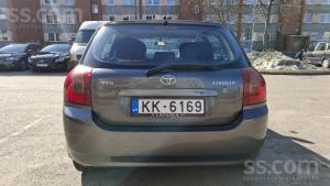 Pelēks Toyota Corolla 2004 Daugavpils, ar dzinēja tilpumu 2.00 L un nobraukumu 303 tūkst. km par 998 €, foto 8 vietnē AUTOMOTO.COM.LV