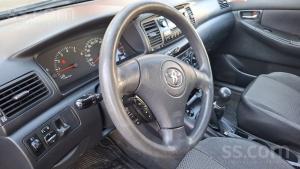 Pelēks Toyota Corolla 2004 Daugavpils, ar dzinēja tilpumu 2.00 L un nobraukumu 303 tūkst. km par 998 €, foto 18 vietnē AUTOMOTO.COM.LV