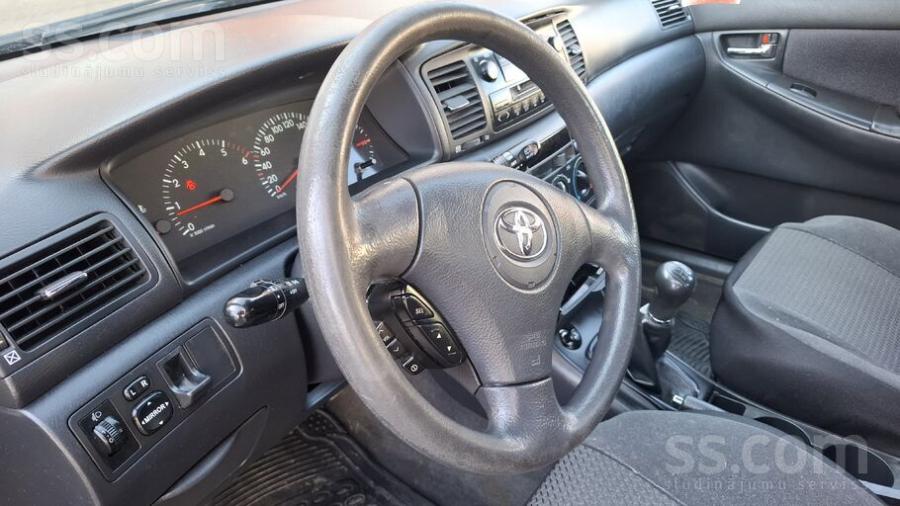 Pelēks Toyota Corolla 2004 Daugavpils, ar dzinēja tilpumu 2.00 L un nobraukumu 303 tūkst. km par 998 €, foto 18 vietnē AUTOMOTO.COM.LV