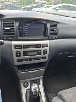 Pelēks Toyota Corolla 2004 Daugavpils, ar dzinēja tilpumu 2.00 L un nobraukumu 0 tūkst. km par 2050 €, foto 14 vietnē AUTOMOTO.COM.LV