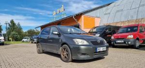 Grey Toyota Corolla 2004 in Valmiera, with an engine capacity of 2.00 L and mileage of 228 thousand km for 1500 €, photo  on AUTOMOTO.COM.LV