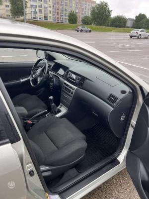 Pelēks Toyota Corolla 2004 Šauļi, ar dzinēja tilpumu 2.00 L un nobraukumu 91 tūkst. km par 2500 €, foto 9 vietnē AUTOMOTO.COM.LV