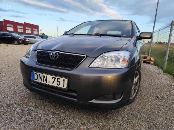 Grey Toyota Corolla 2004 in Klaipeda, with an engine capacity of 2.00 L and mileage of 234 thousand km for 699 €, photo 5 on AUTOMOTO.COM.LV