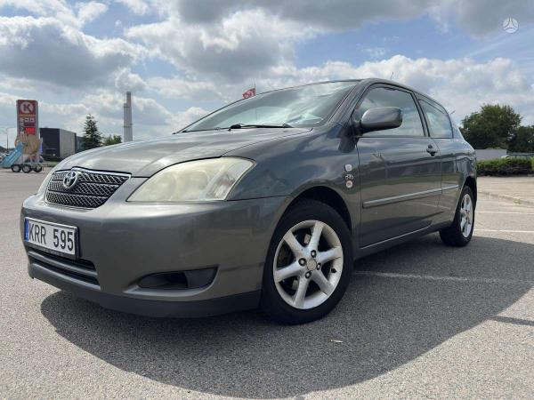 Pelēks Toyota Corolla 2004 Viļņa, ar dzinēja tilpumu 2.00 L un nobraukumu 251 tūkst. km par 1150 €, foto 1 vietnē AUTOMOTO.COM.LV