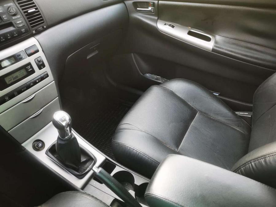 Pelēks Toyota Corolla 2004 Viļņa, ar dzinēja tilpumu 1.80 L un nobraukumu 93 tūkst. km par 3450 €, foto 8 vietnē AUTOMOTO.COM.LV