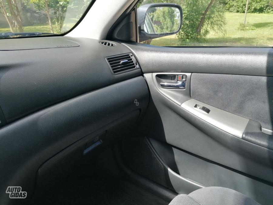 Grey Toyota Corolla 2004 in Moletai, with an engine capacity of 2.00 L and mileage of 281 thousand km for 1200 €, photo 14 on AUTOMOTO.COM.LV