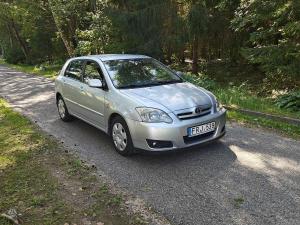 Pelēks Toyota Corolla 2004 Viļņa, ar dzinēja tilpumu 2.00 L un nobraukumu 350 tūkst. km par 950 €, foto 10 vietnē AUTOMOTO.COM.LV