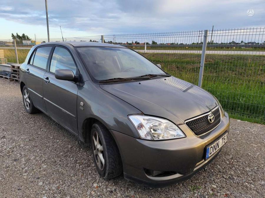 Grey Toyota Corolla 2004 in Klaipeda, with an engine capacity of 2.00 L and mileage of 245 thousand km for 199 €, photo 5 on AUTOMOTO.COM.LV