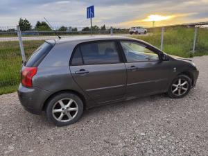 Grey Toyota Corolla 2004 in Klaipeda, with an engine capacity of 2.00 L and mileage of 245 thousand km for 199 €, photo 6 on AUTOMOTO.COM.LV