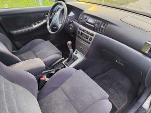 Grey Toyota Corolla 2004 in Klaipeda, with an engine capacity of 2.00 L and mileage of 245 thousand km for 199 €, photo 7 on AUTOMOTO.COM.LV