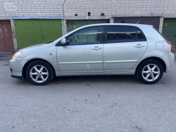 Pelēks Toyota Corolla 2005 Viļņa, ar dzinēja tilpumu 1.40 L un nobraukumu 205 tūkst. km par 1900 €, foto 3 vietnē AUTOMOTO.COM.LV