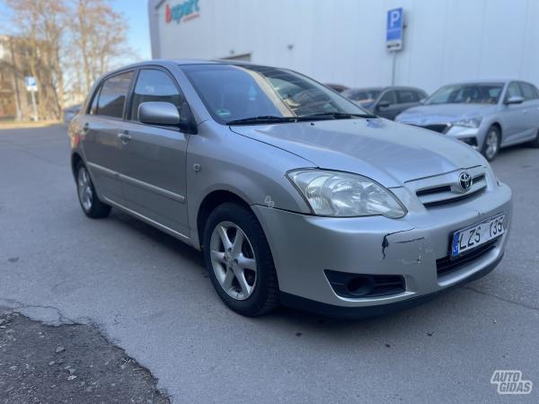 Pelēks Toyota Corolla 2005 Viļņa, ar dzinēja tilpumu 1.40 L un nobraukumu 205 tūkst. km par 1900 €, foto 7 vietnē AUTOMOTO.COM.LV