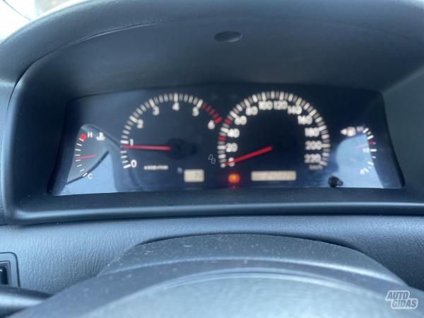 Pelēks Toyota Corolla 2005 Viļņa, ar dzinēja tilpumu 1.40 L un nobraukumu 205 tūkst. km par 1800 €, foto 11 vietnē AUTOMOTO.COM.LV