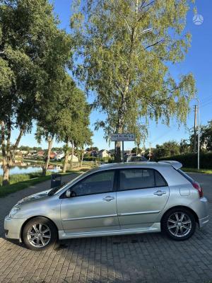 Pelēks Toyota Corolla 2005 Vievis, ar dzinēja tilpumu 1.40 L un nobraukumu 359 tūkst. km par 1989 €, foto 4 vietnē AUTOMOTO.COM.LV