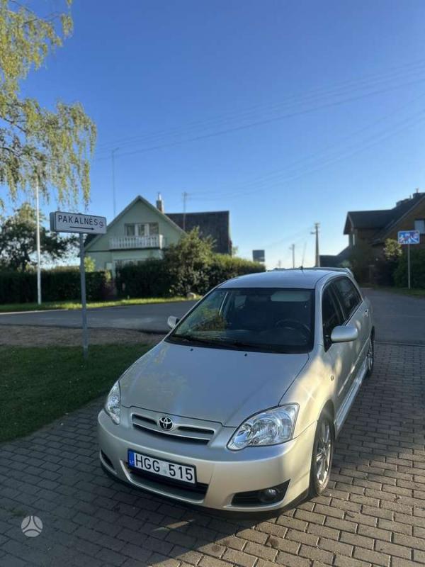 Pelēks Toyota Corolla 2005 Vievis, ar dzinēja tilpumu 1.40 L un nobraukumu 359 tūkst. km par 1989 €, foto 9 vietnē AUTOMOTO.COM.LV