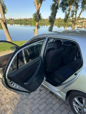 Pelēks Toyota Corolla 2005 Vievis, ar dzinēja tilpumu 1.40 L un nobraukumu 359 tūkst. km par 1989 €, foto 13 vietnē AUTOMOTO.COM.LV