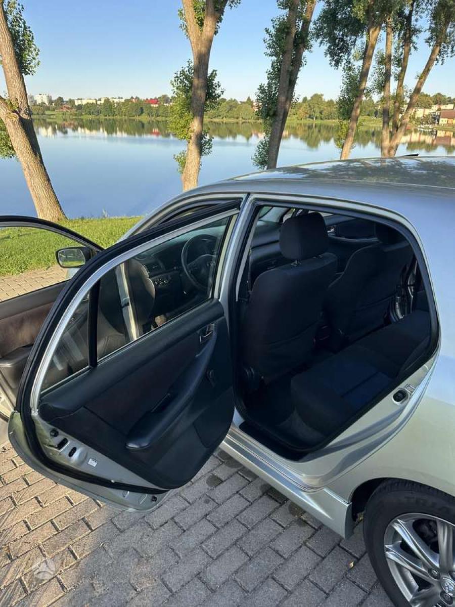 Pelēks Toyota Corolla 2005 Vievis, ar dzinēja tilpumu 1.40 L un nobraukumu 359 tūkst. km par 1989 €, foto 13 vietnē AUTOMOTO.COM.LV