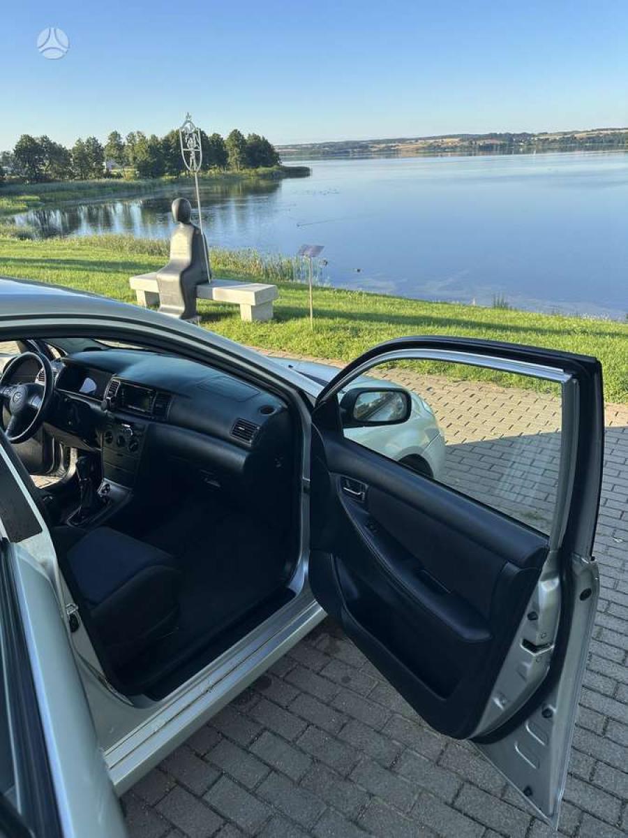 Pelēks Toyota Corolla 2005 Vievis, ar dzinēja tilpumu 1.40 L un nobraukumu 359 tūkst. km par 1989 €, foto 17 vietnē AUTOMOTO.COM.LV