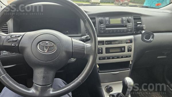 Pelēks Toyota Corolla 2005 Rīga, ar dzinēja tilpumu 1.40 L un nobraukumu 379 tūkst. km par 1000 €, foto 8 vietnē AUTOMOTO.COM.LV