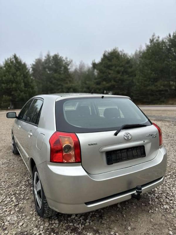 Pelēks Toyota Corolla 2006 Vievis, ar dzinēja tilpumu 1.40 L un nobraukumu 219 tūkst. km par 1960 €, foto 4 vietnē AUTOMOTO.COM.LV