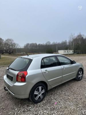 Pelēks Toyota Corolla 2006 Vievis, ar dzinēja tilpumu 1.40 L un nobraukumu 219 tūkst. km par 1960 €, foto 6 vietnē AUTOMOTO.COM.LV