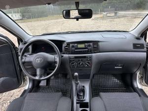 Pelēks Toyota Corolla 2006 Vievis, ar dzinēja tilpumu 1.40 L un nobraukumu 219 tūkst. km par 1960 €, foto 15 vietnē AUTOMOTO.COM.LV