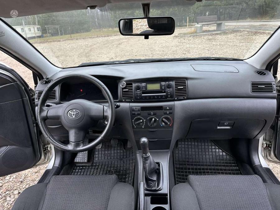 Pelēks Toyota Corolla 2006 Vievis, ar dzinēja tilpumu 1.40 L un nobraukumu 219 tūkst. km par 1960 €, foto 15 vietnē AUTOMOTO.COM.LV
