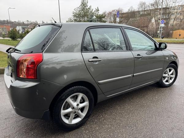 Grey Toyota Corolla 2006 in Kaunas, with an engine capacity of 2.00 L and mileage of 317 thousand km for 1950 €, photo 6 on AUTOMOTO.COM.LV