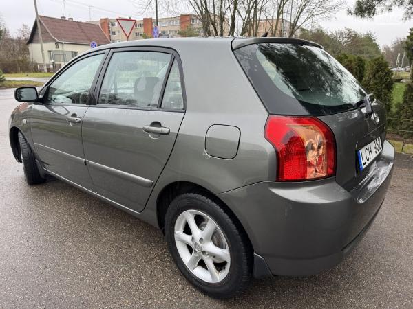 Grey Toyota Corolla 2006 in Kaunas, with an engine capacity of 2.00 L and mileage of 317 thousand km for 1950 €, photo 9 on AUTOMOTO.COM.LV