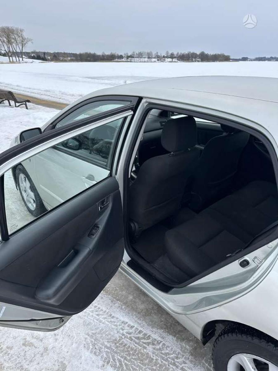 Grey Toyota Corolla 2006 in Vievis, with an engine capacity of 2.00 L and mileage of 206 thousand km for 1999 €, photo 12 on AUTOMOTO.COM.LV