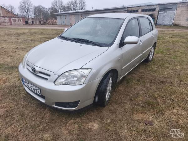 Pelēks Toyota Corolla 2006 Ignalina, ar dzinēja tilpumu 2.00 L un nobraukumu 299 tūkst. km par 1100 €, foto 2 vietnē AUTOMOTO.COM.LV