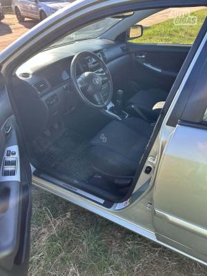 Pelēks Toyota Corolla 2006 Viļņa, ar dzinēja tilpumu 2.00 L un nobraukumu 276 tūkst. km par 1800 €, foto 7 vietnē AUTOMOTO.COM.LV