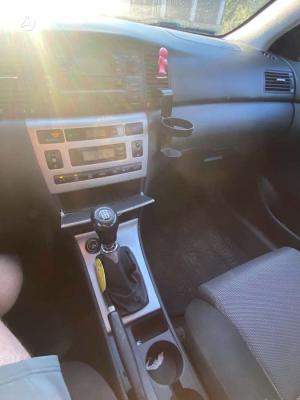Pelēks Toyota Corolla 2006 Šauļi, ar dzinēja tilpumu 2.00 L un nobraukumu 303 tūkst. km par 1450 €, foto  vietnē AUTOMOTO.COM.LV