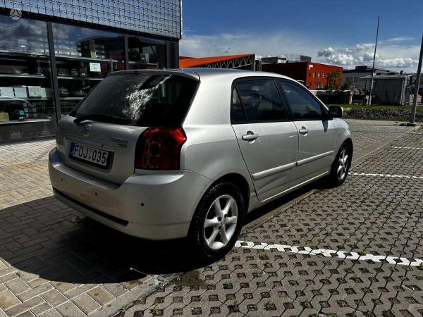 Grey Toyota Corolla 2006 in Kaunas, with an engine capacity of 2.00 L and mileage of 323 thousand km for 1000 €, photo 5 on AUTOMOTO.COM.LV