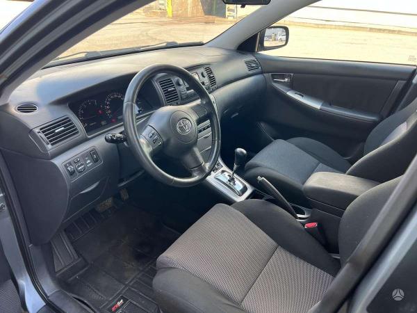 Grey Toyota Corolla 2006 in Vilnius, with an engine capacity of 1.40 L and mileage of 220 thousand km for 2499 €, photo 5 on AUTOMOTO.COM.LV