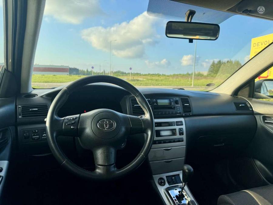 Grey Toyota Corolla 2006 in Panevezys, with an engine capacity of 1.40 L and mileage of 207 thousand km for 1850 €, photo 10 on AUTOMOTO.COM.LV