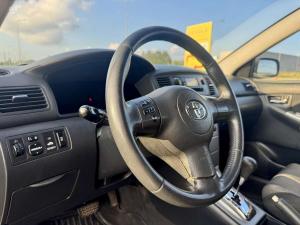 Grey Toyota Corolla 2006 in Panevezys, with an engine capacity of 1.40 L and mileage of 207 thousand km for 1850 €, photo 11 on AUTOMOTO.COM.LV