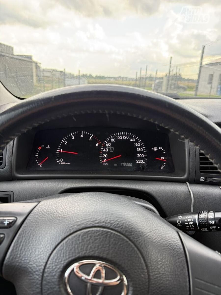 Pelēks Toyota Corolla 2006 Kauņa, ar dzinēja tilpumu 2.00 L un nobraukumu 178 tūkst. km par 2000 €, foto 9 vietnē AUTOMOTO.COM.LV
