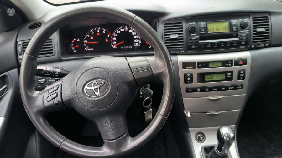 Grey Toyota Corolla 2006 in Vilnius, with an engine capacity of 2.00 L and mileage of 250 thousand km for 1900 €, photo 29 on AUTOMOTO.COM.LV